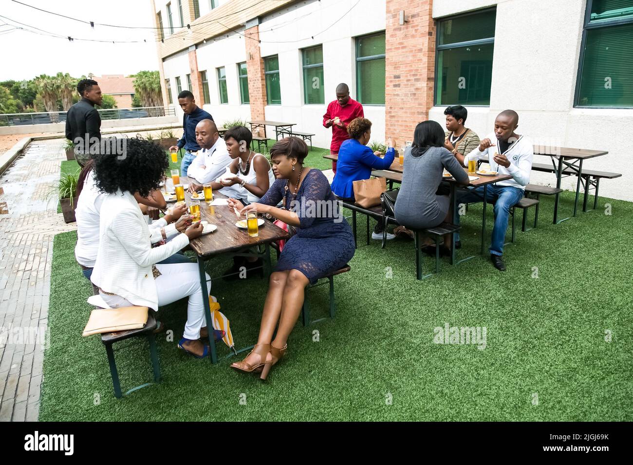 A group of young African students socializing on campus Stock Photo - Alamy