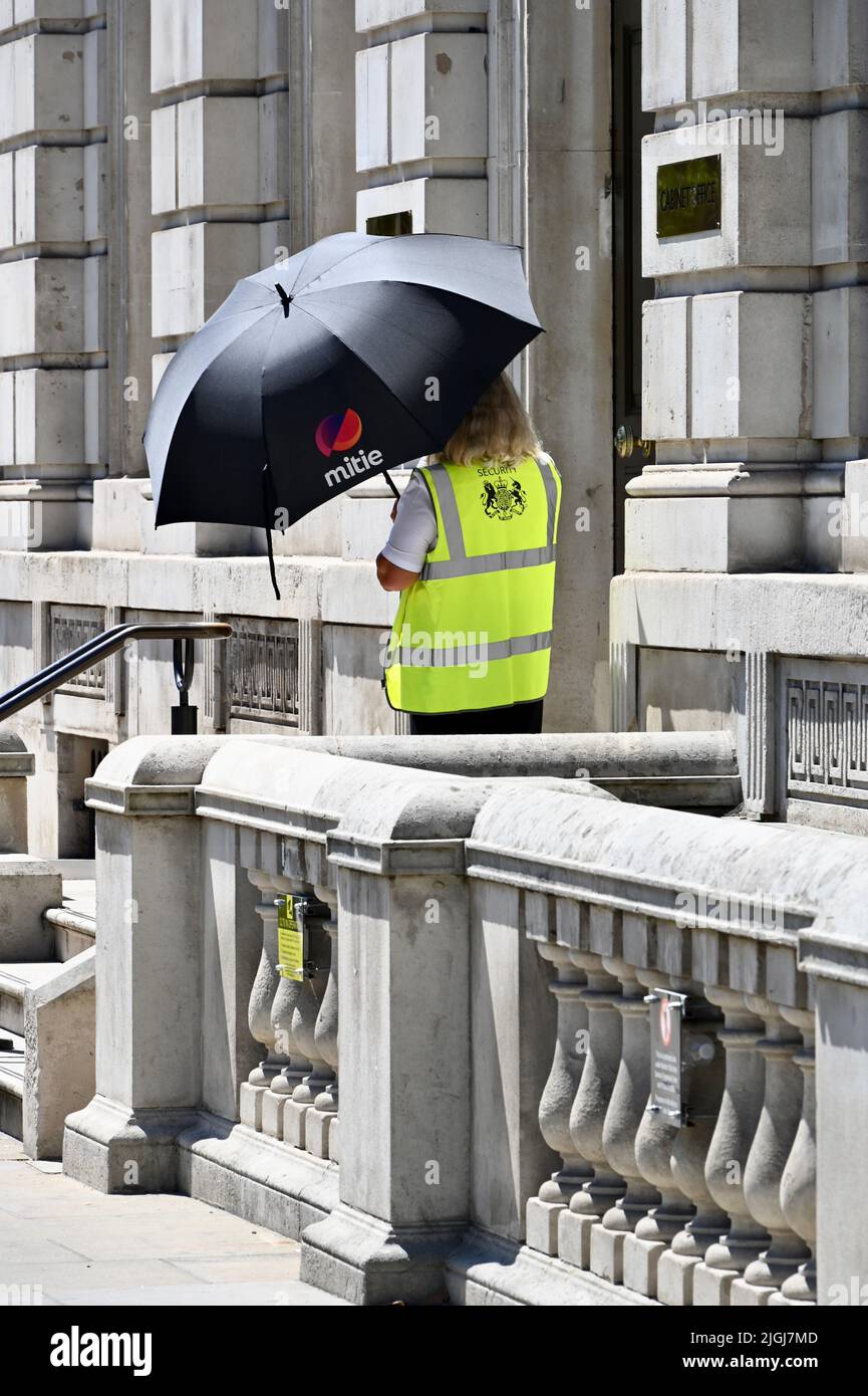 London, UK.The Cabinet Office. A government security officer keeps cool ...