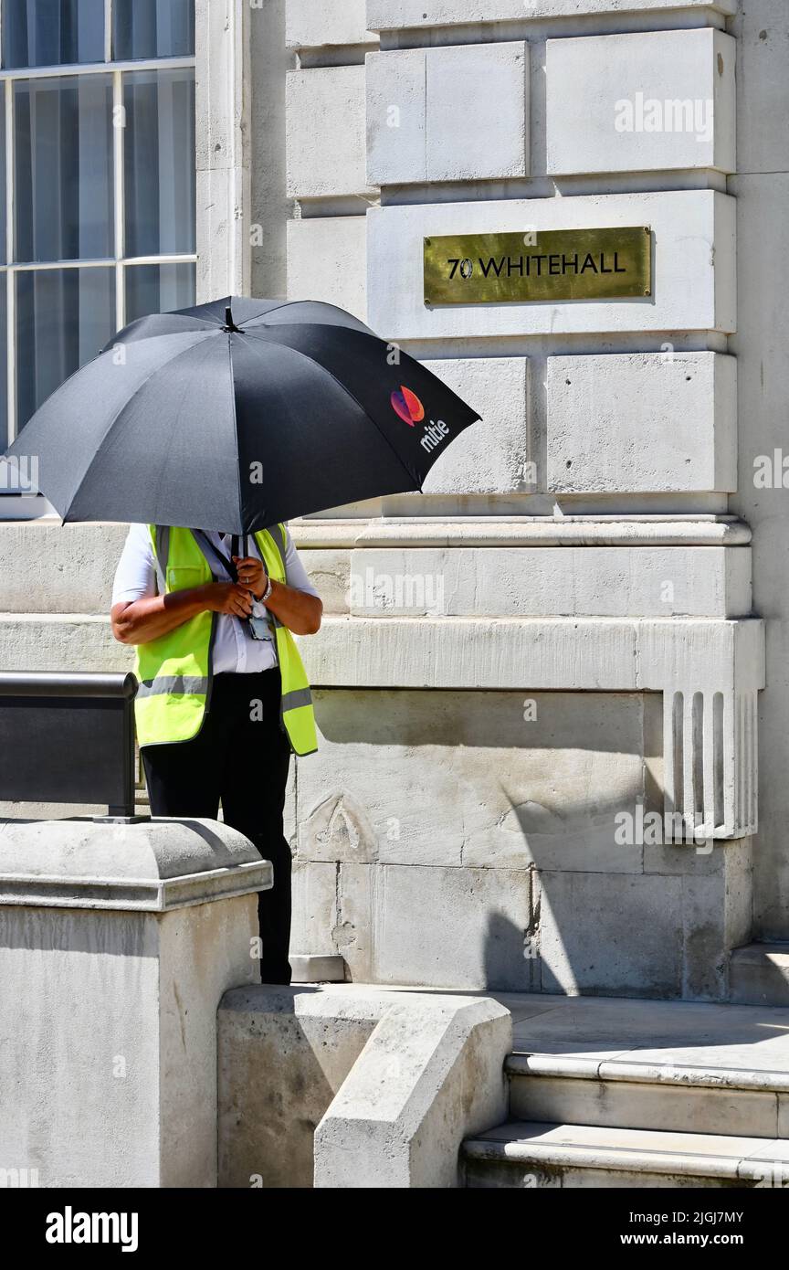 London, UK.The Cabinet Office. A government security officer keeps cool ...