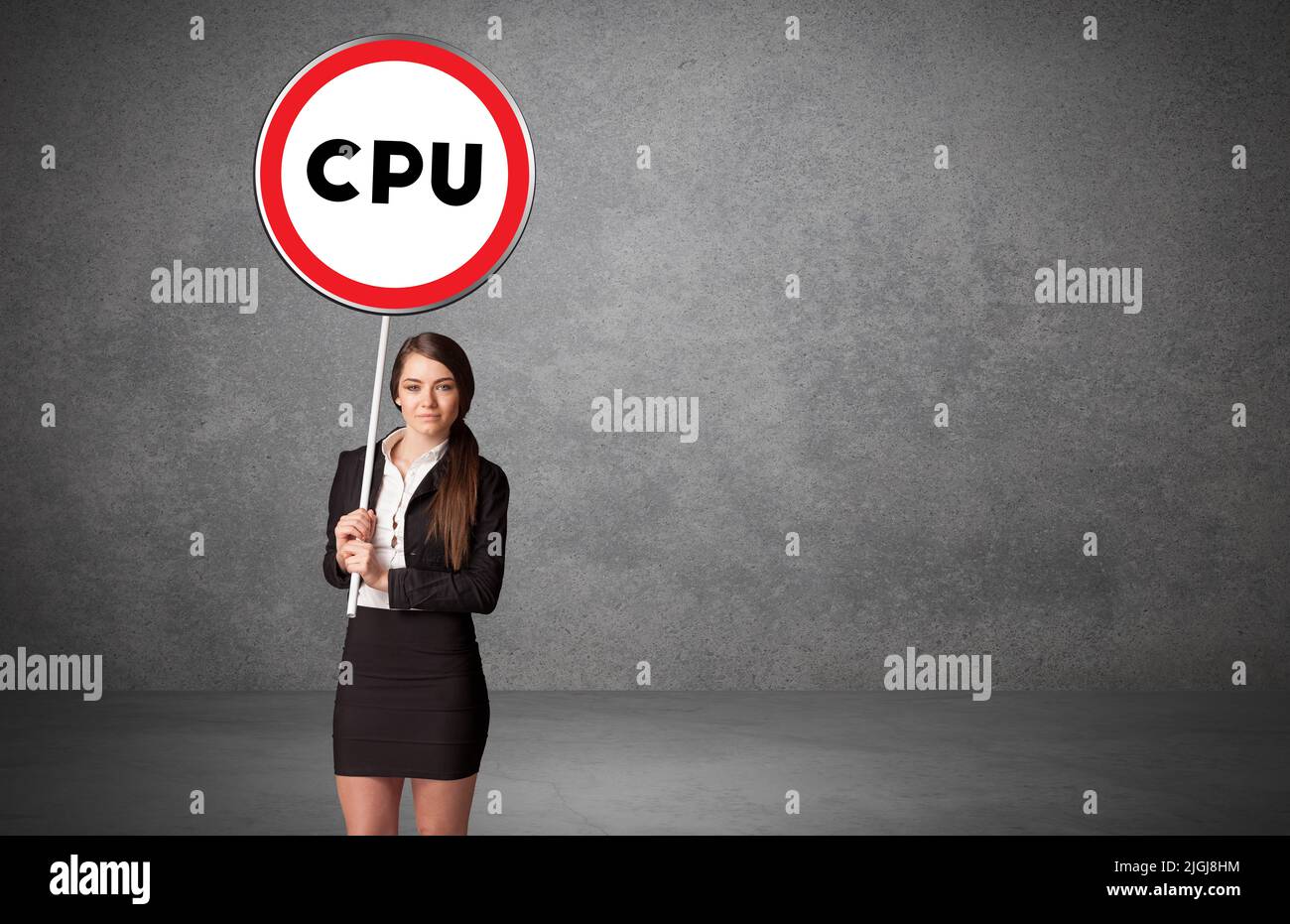 Young business person holdig traffic sign Stock Photo - Alamy