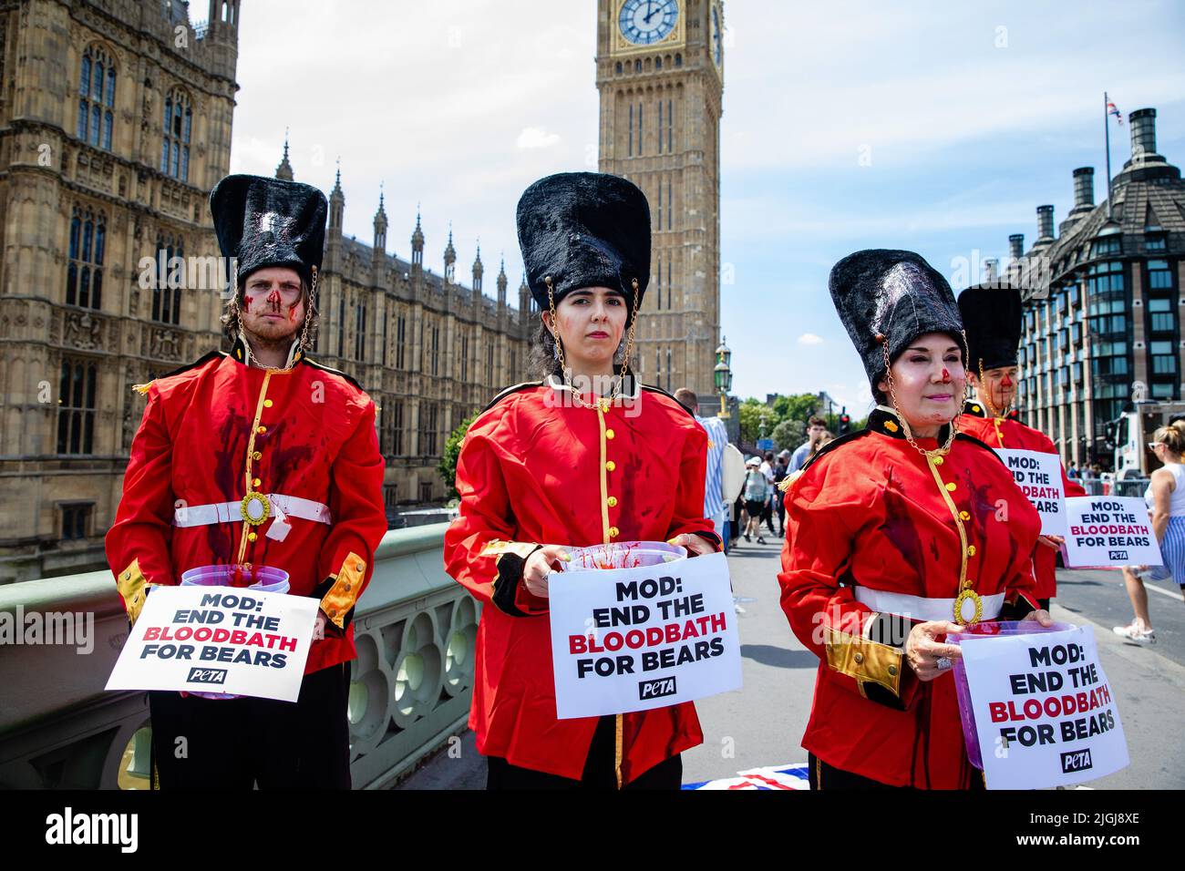 London, UK. 11th July, 2022. PETA supporters dressed as guards pose ...