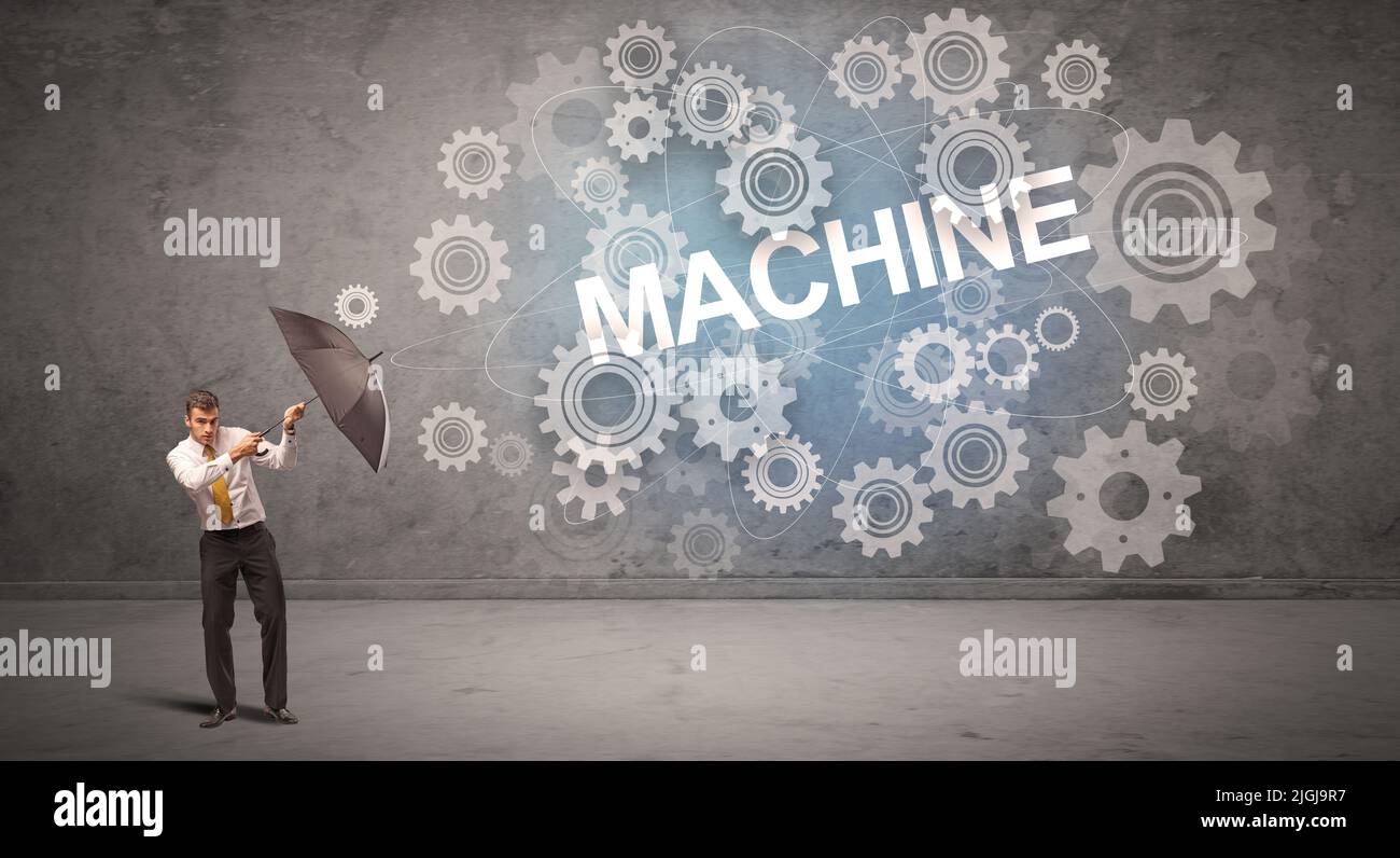 Businessman defending with umbrella concept Stock Photo - Alamy