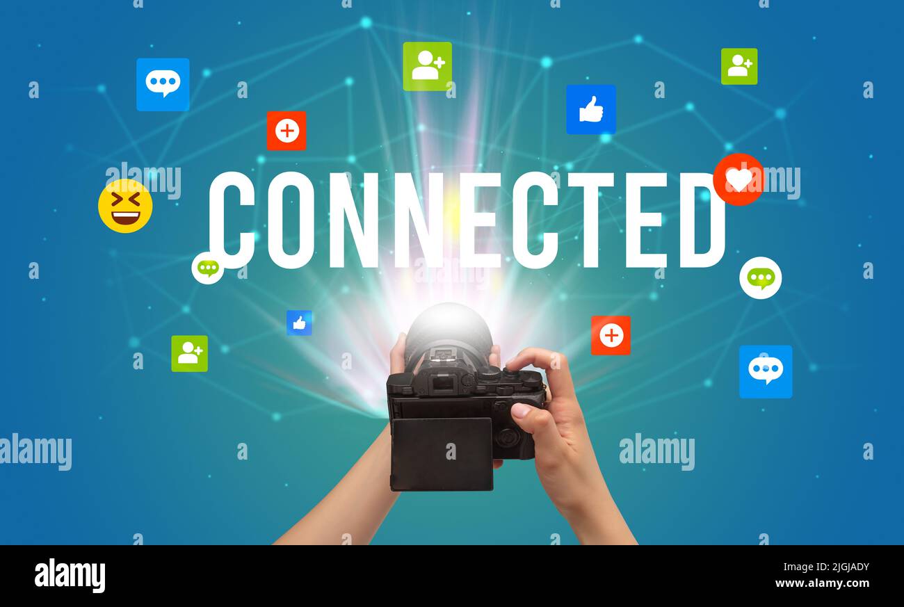Using camera to capture social media content Stock Photo - Alamy