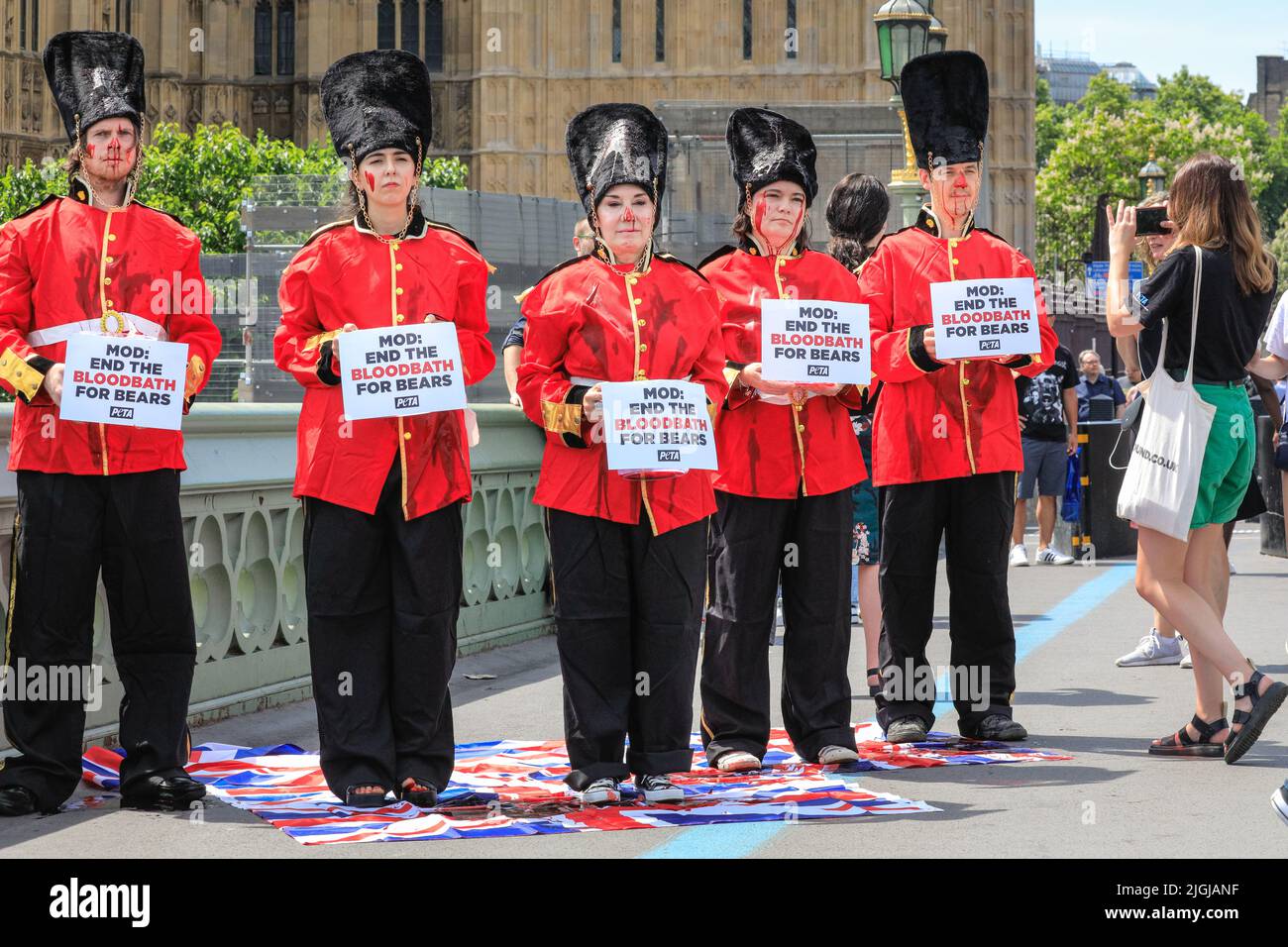 London, UK. 11th July, 2022. A group of PETA supporters dressed as ...