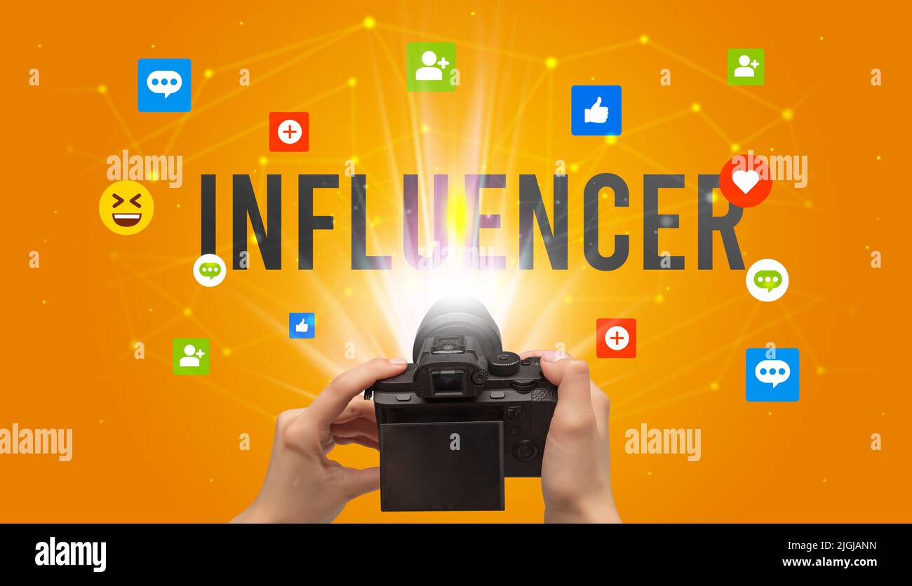 Using camera to capture social media content Stock Photo - Alamy