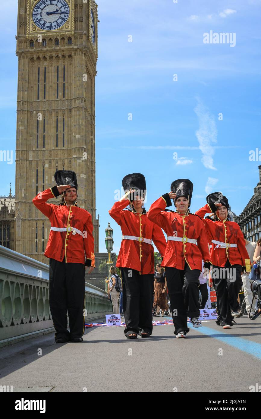 London, UK. 11th July, 2022. A group of PETA supporters dressed as ...