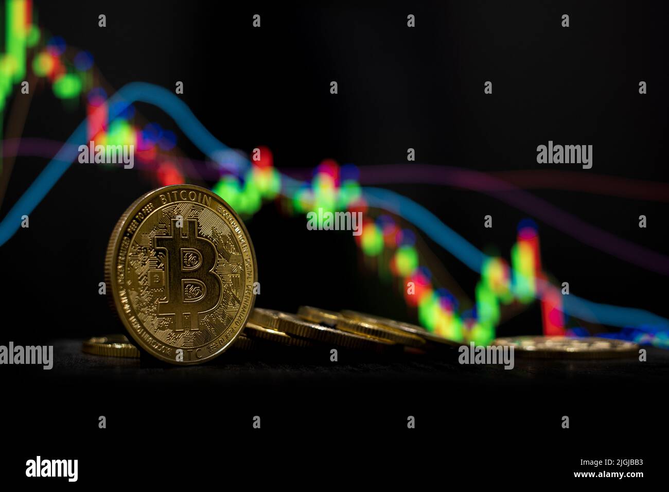 Golden bitcoin cryptocurrency at trading chart background Stock Photo ...