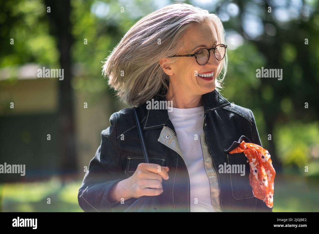 Stylish woman smiling hi-res stock photography and images - Alamy