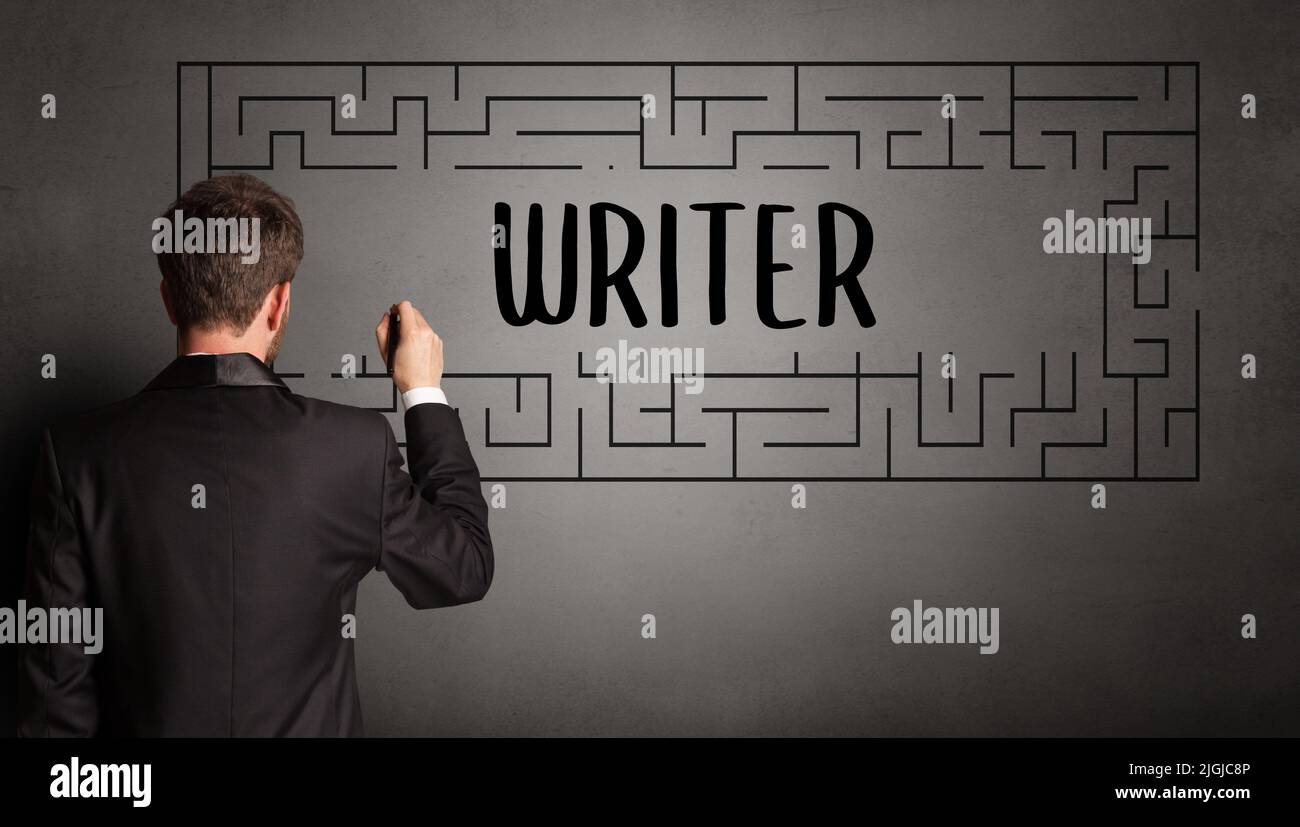 businessman drawing maze concept Stock Photo - Alamy