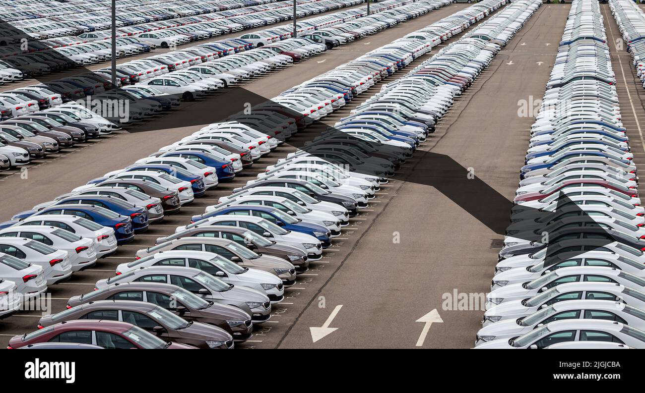 The concept of a decline in car production or prices. Manufacturing ...