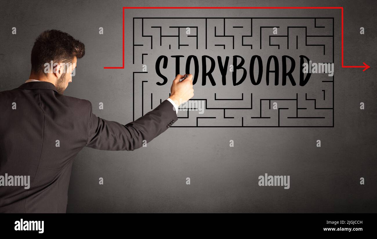 businessman drawing maze concept Stock Photo - Alamy