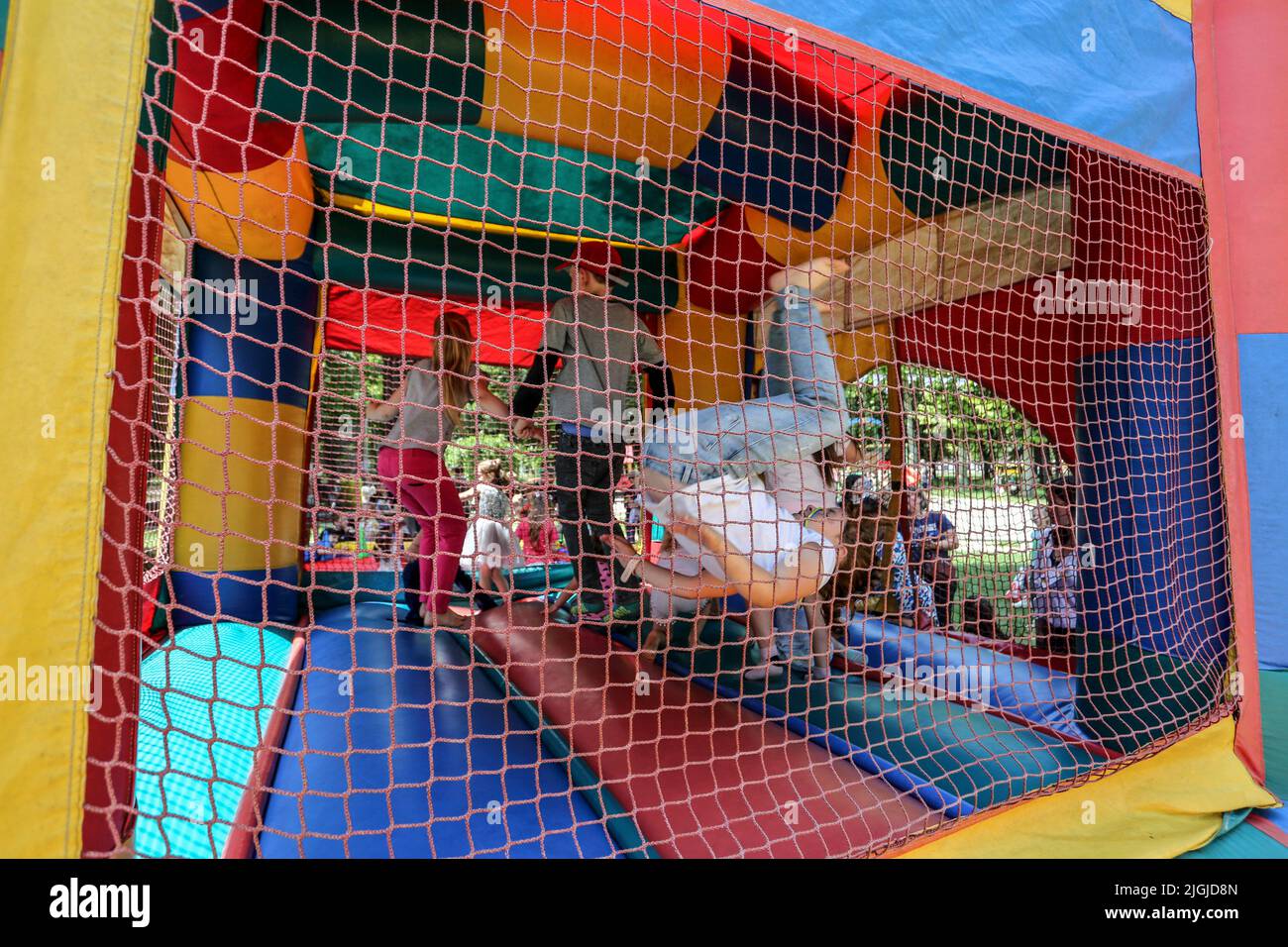 Odessa, Ukraine. 31st May, 2022. Children seen jumping on an inflatable ...