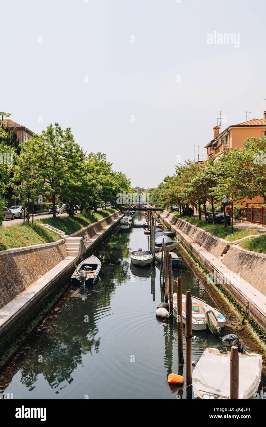 Venice, Italy - May 22, 2022: Private boats moored on both sides of a ...