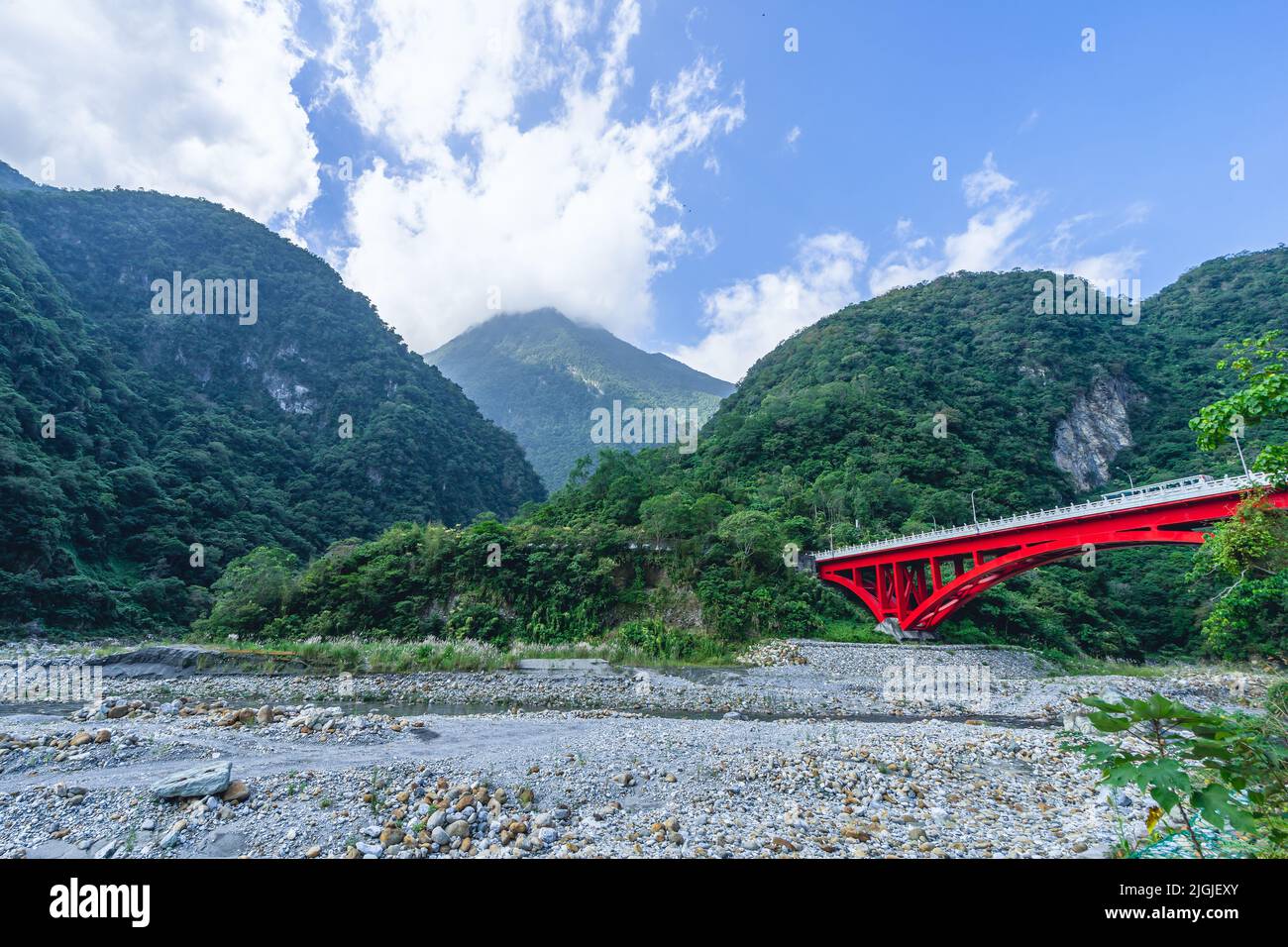 Beautiful natural scenic with the red bridge and mountain in the ...