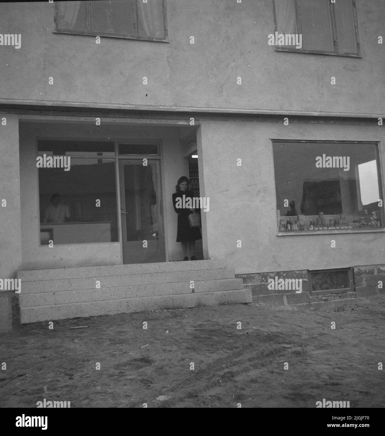 Posing at the window Black and White Stock Photos & Images - Alamy