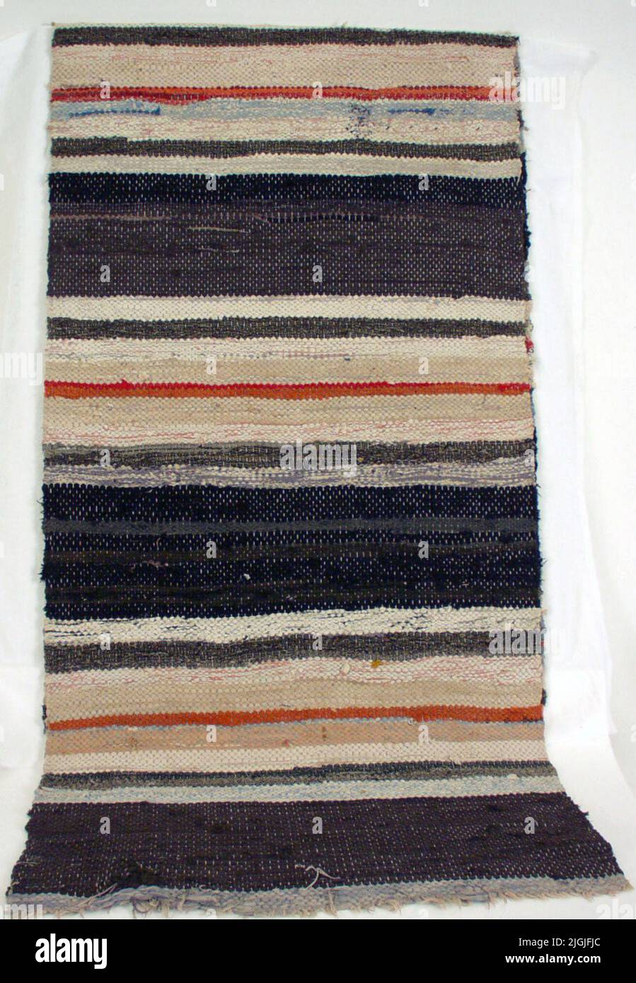 Trasmatta Rag rug. In black, pale red, blue and white, divided into two ...