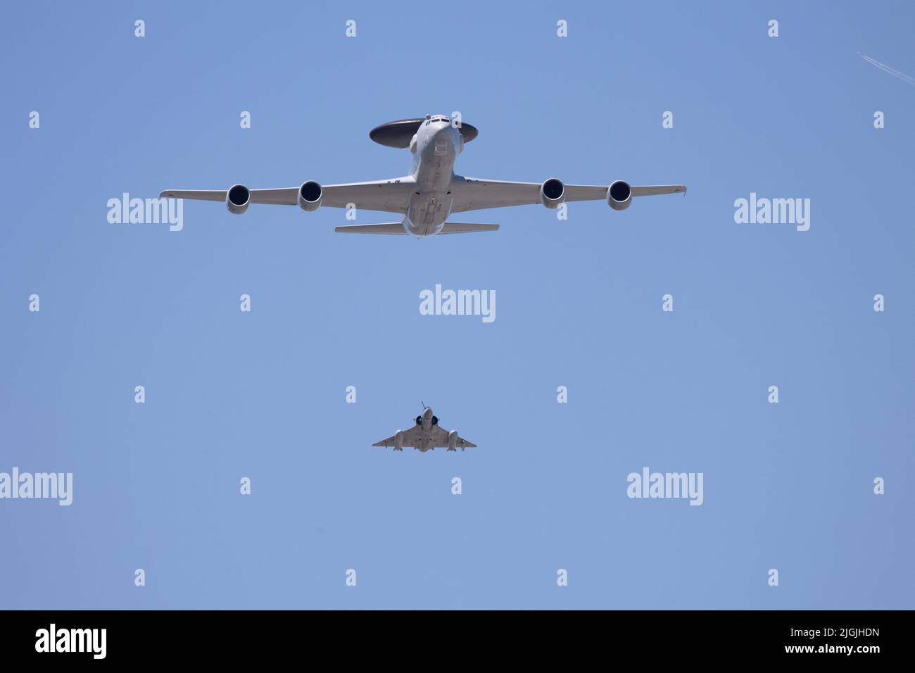 E-3F Awacs and a mirage fly over La Defense business district during a ...