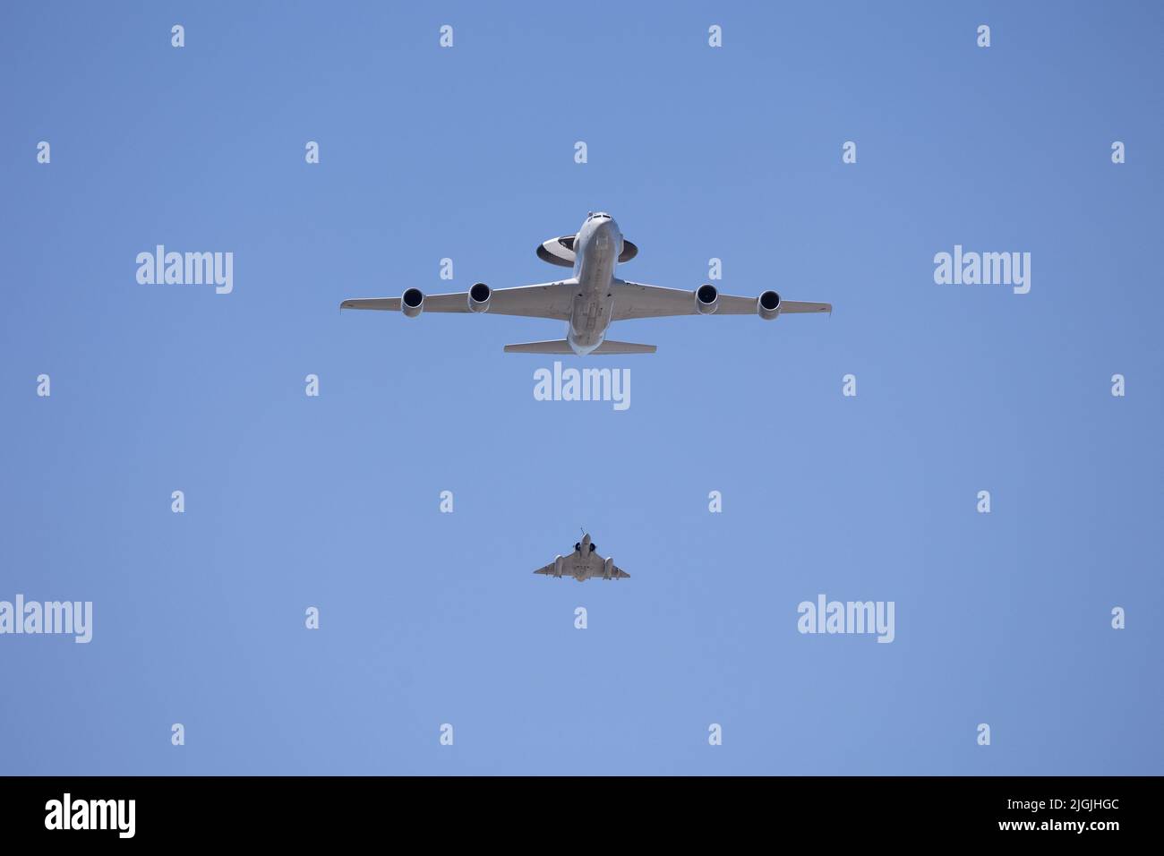 E-3F Awacs and a mirage fly over La Defense business district during a ...
