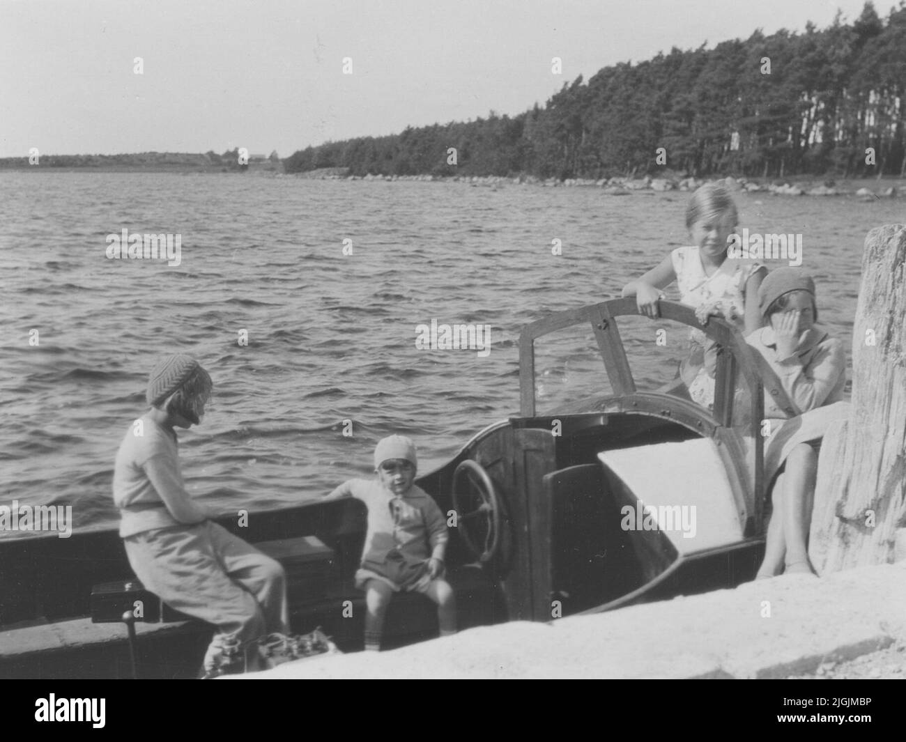 Brygga In Sigfrid Leander's boat "Three Töser". From left Gunn, Lars ...