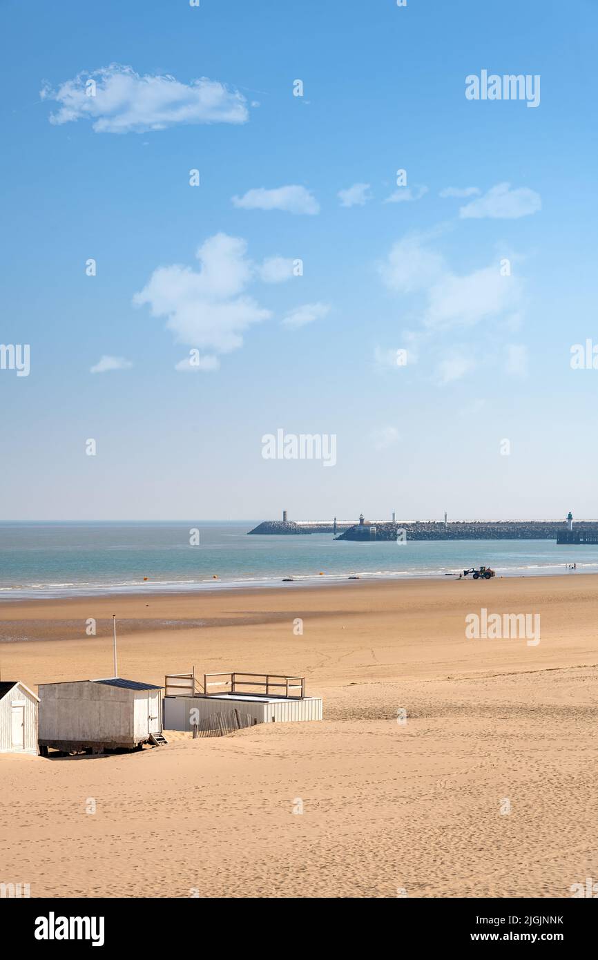 Calais beach and the entrance of the harbour, northern France Stock ...