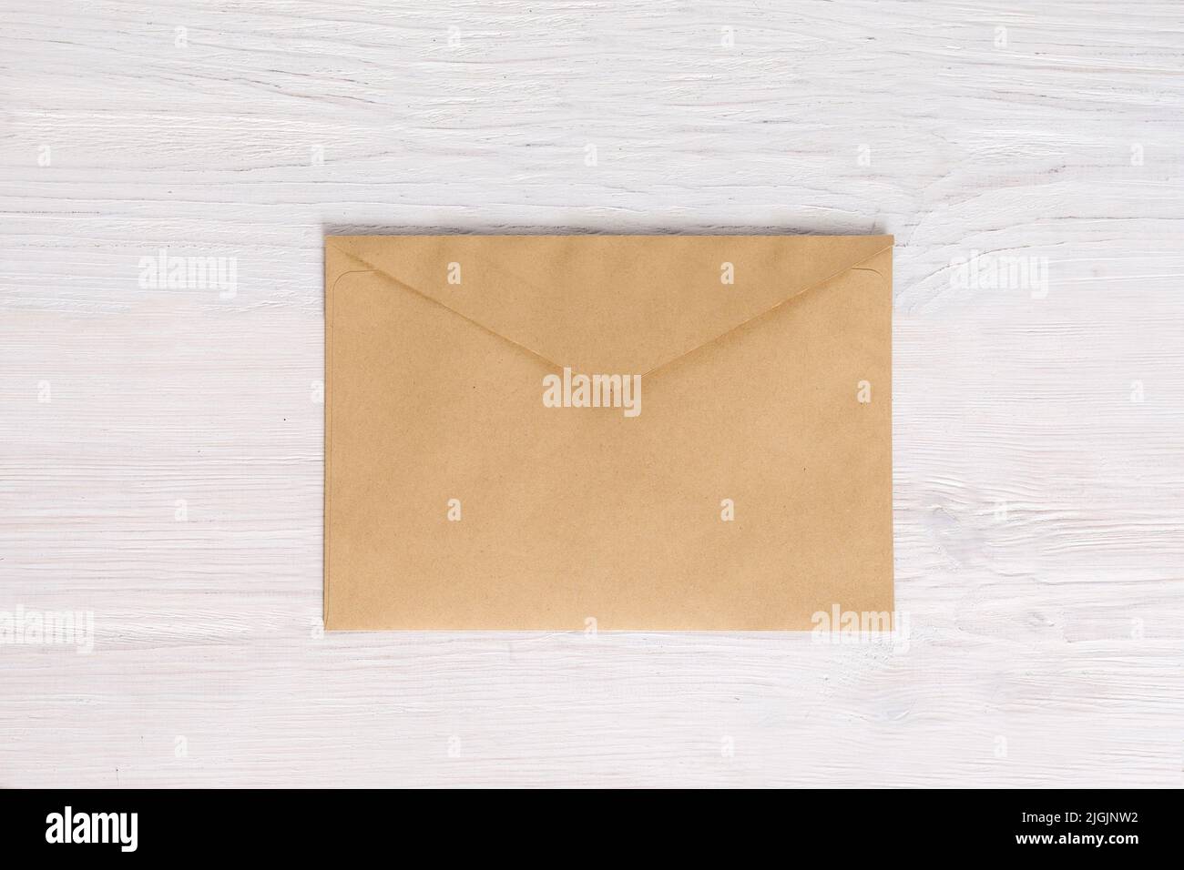 Empty envelope blank on white wooden background Stock Photo - Alamy