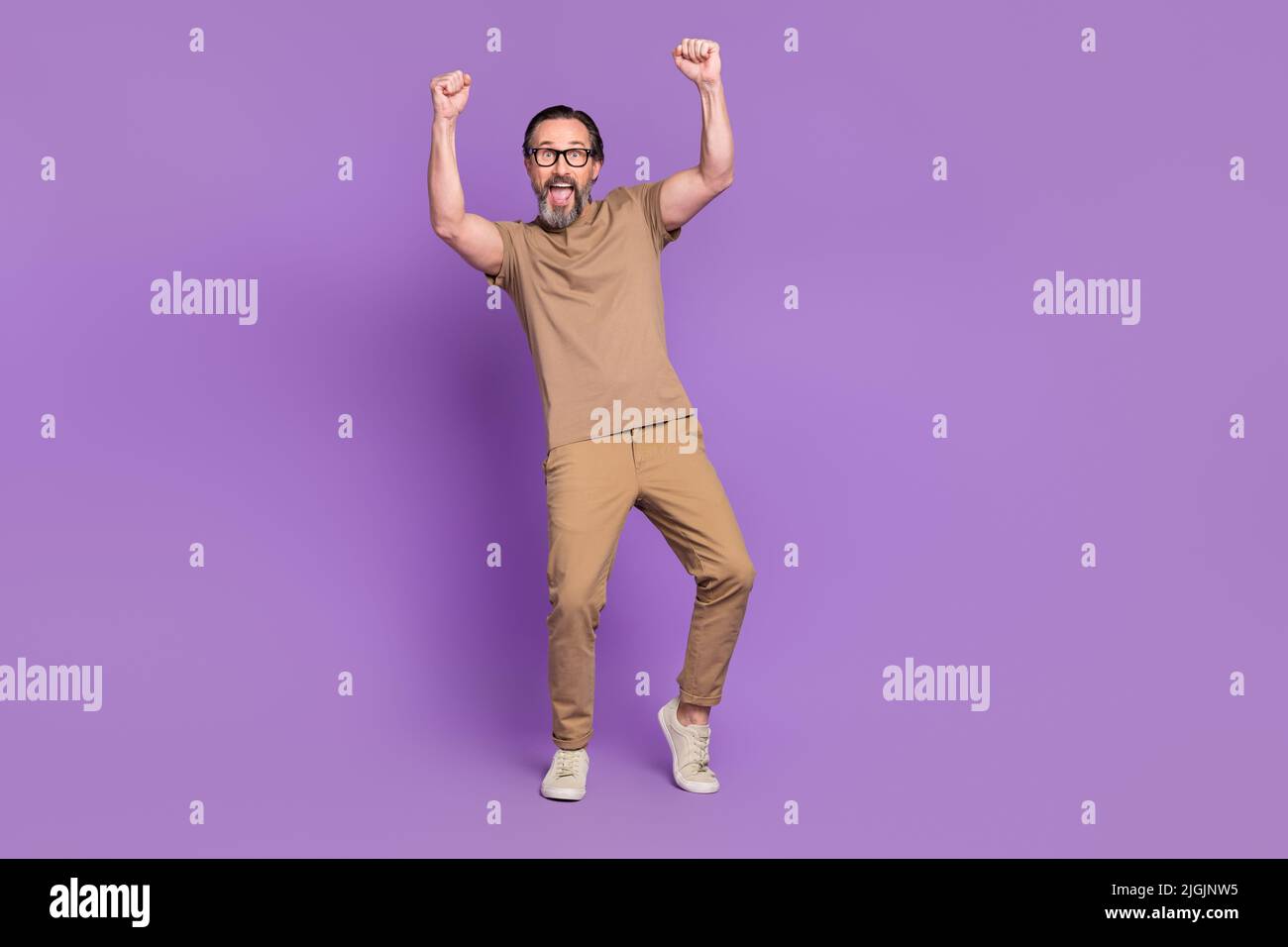 Full body photo of excited mature man rejoice luck fists hands awesome ...