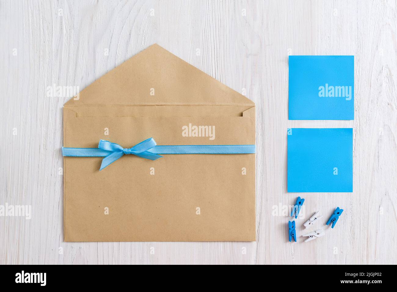 Envelope with ribbon hi-res stock photography and images - Alamy