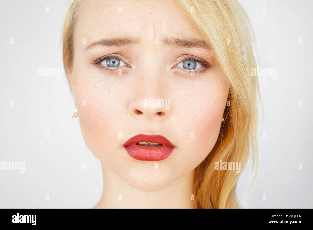 Portrait of sad red-haired woman Stock Photo - Alamy