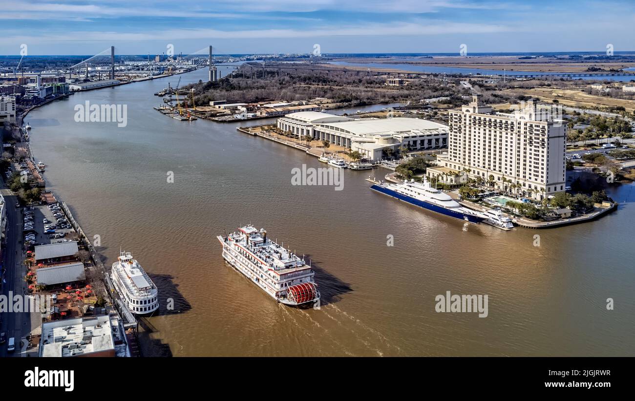 Aerial view of historic district, Savannah River, the Convention Center ...