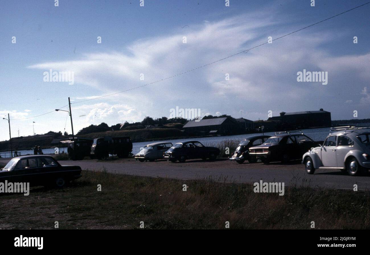 The parking at Finnish with various passenger cars and military ...
