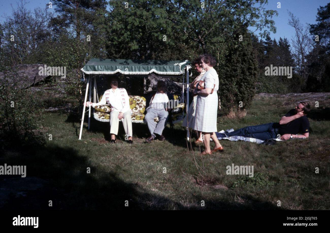 Group photo at a hammock. The woman at the far right (standing) is Åke ...