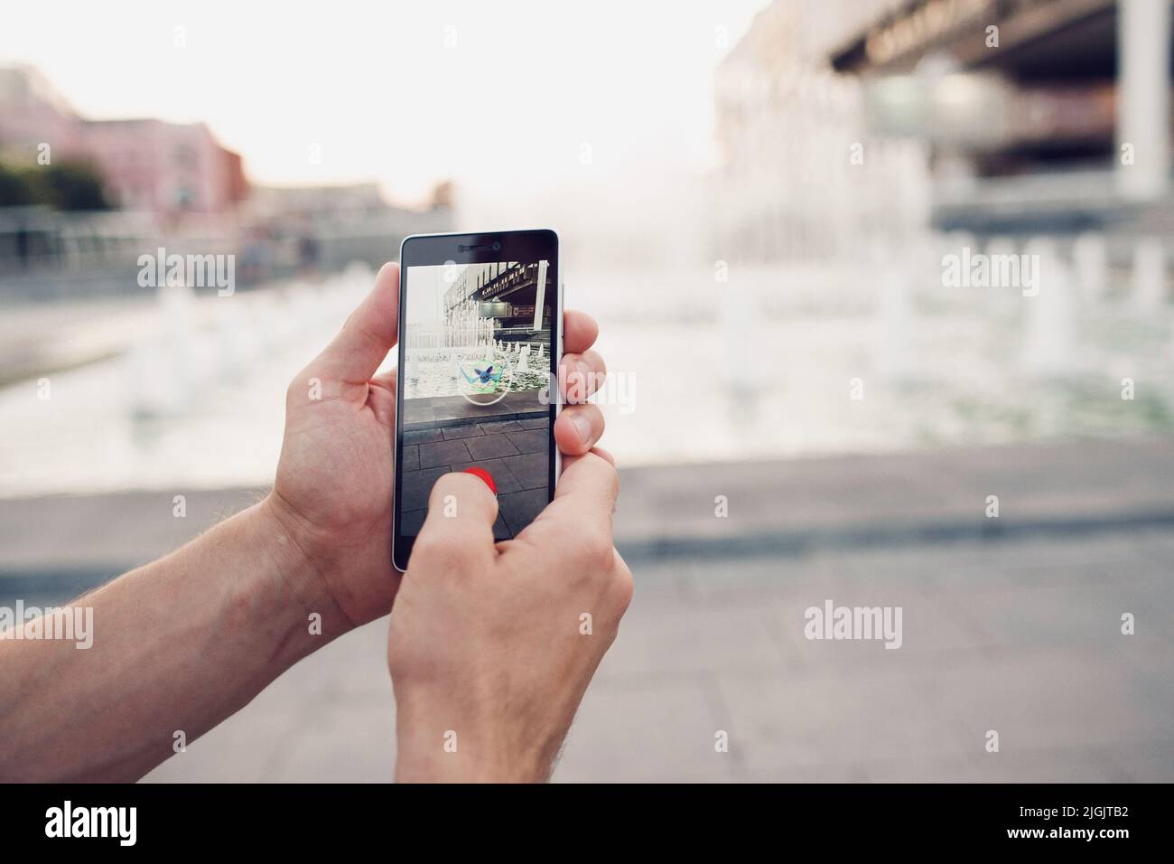Pokemon Go mobile game. Catching pokemon online Stock Photo - Alamy