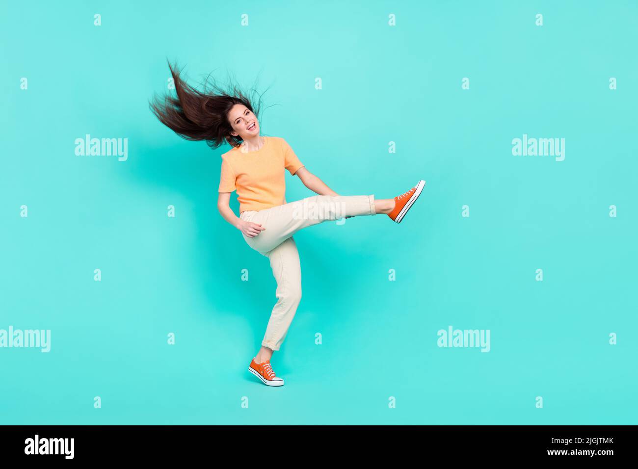 Full body photo of overjoyed cheerful person hands hold leg play guitar ...