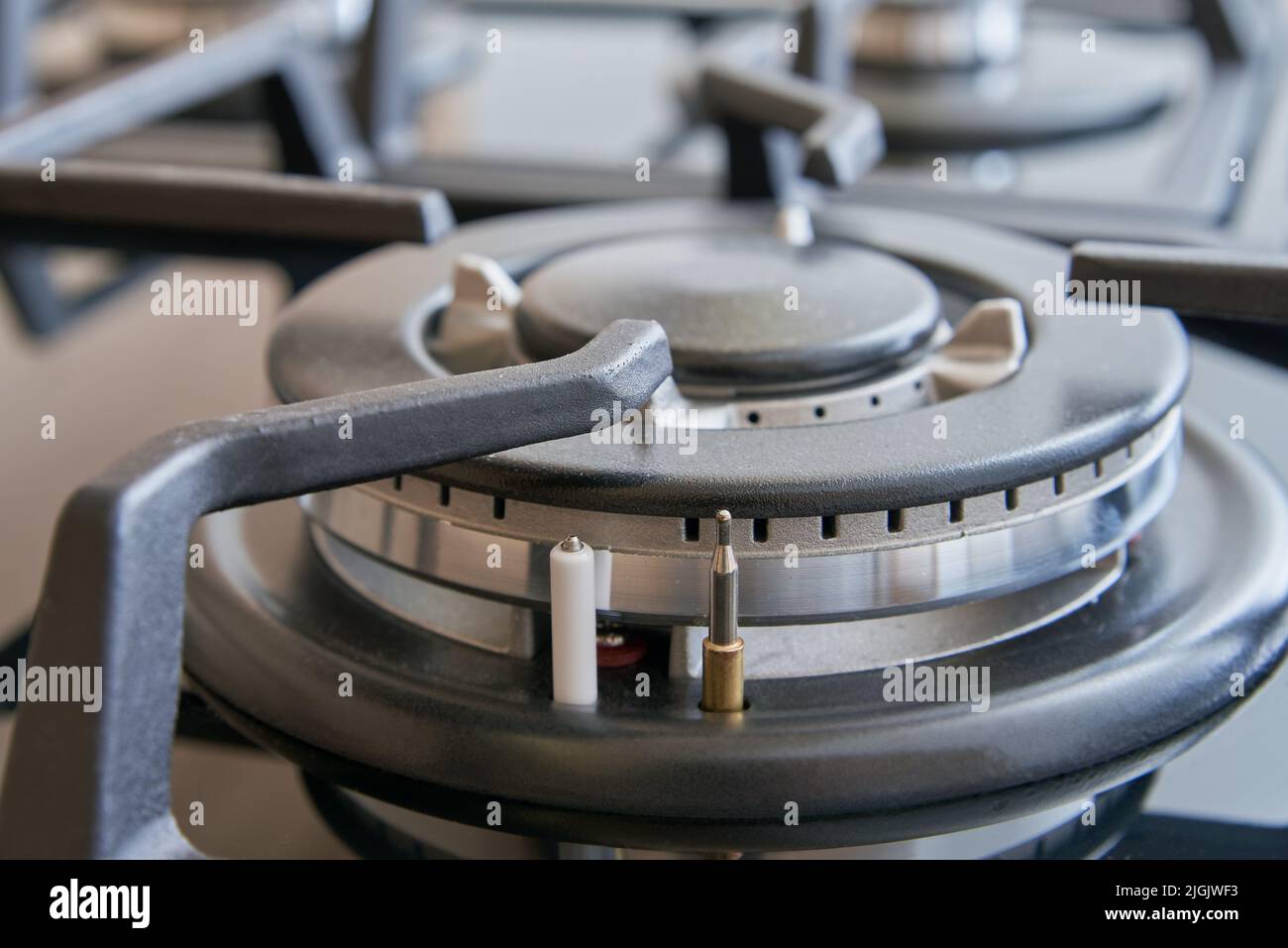 New kitchen stove with gas hob, close up. Modern kitchen appliance ...