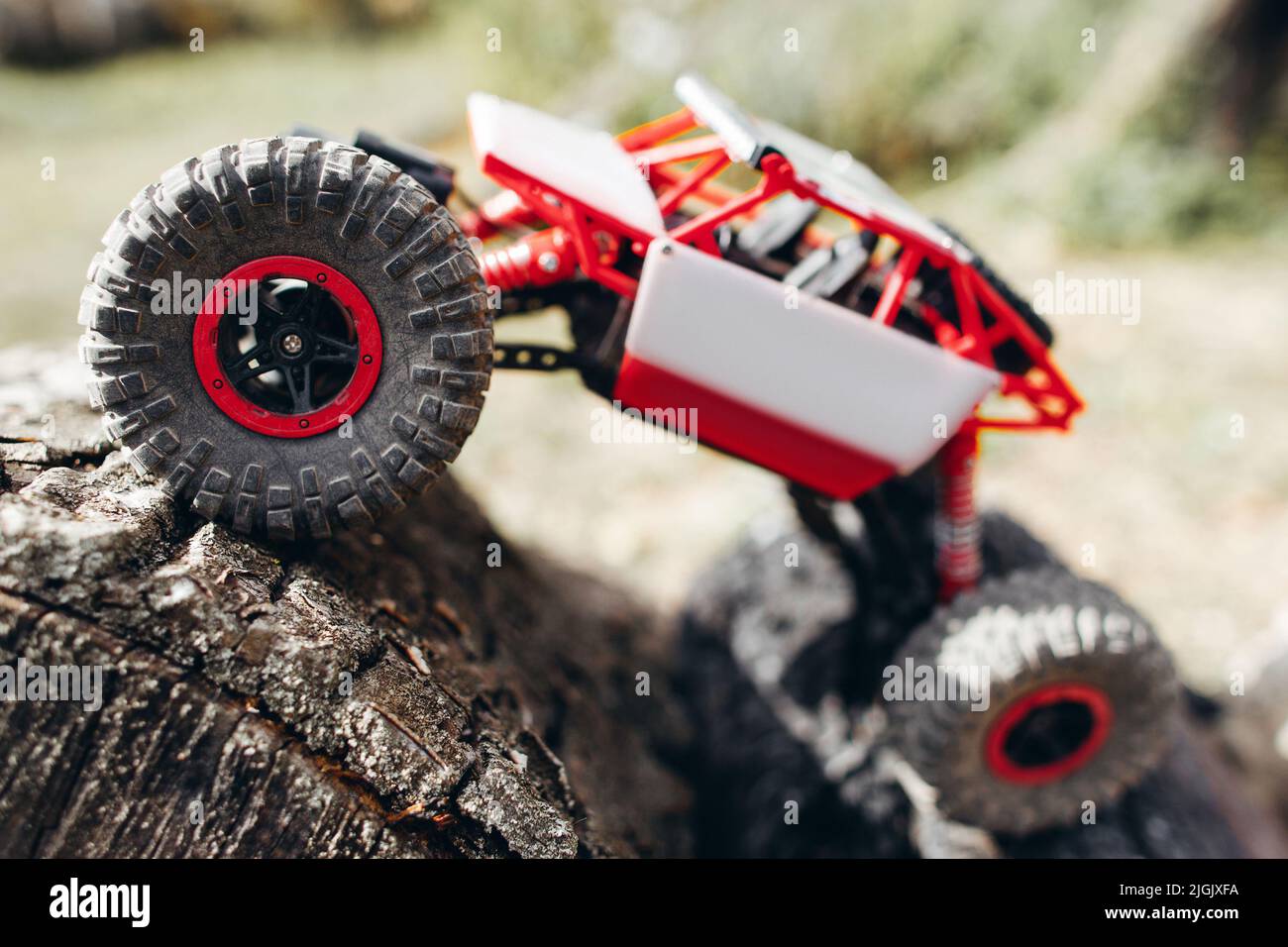 Rc crawler rising on wood side view Stock Photo - Alamy