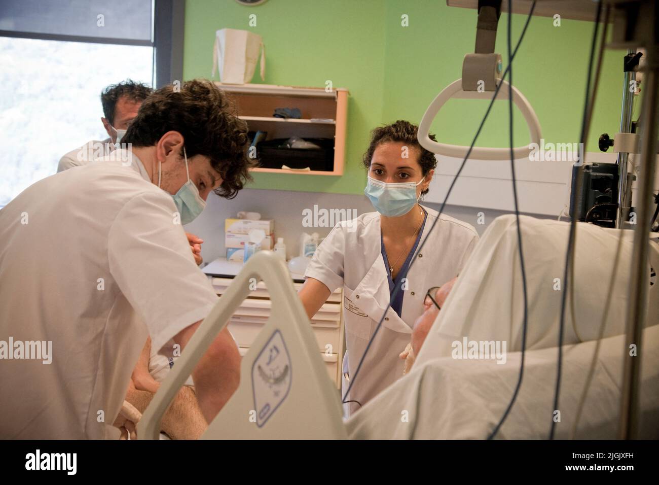 Doctors oscultate through the trachea a patient with Charcot s disease ...