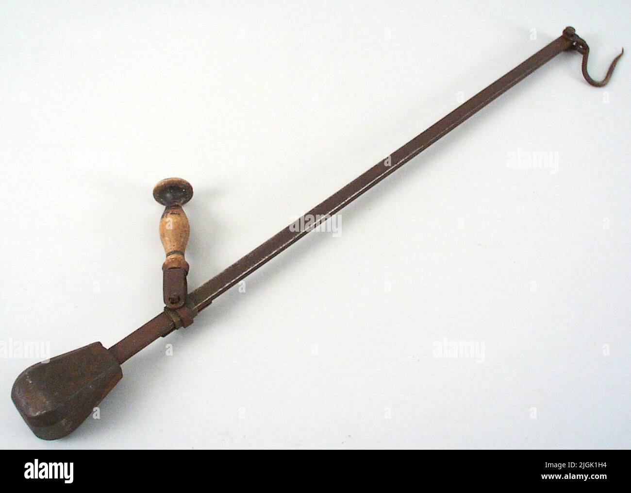 Besman Besman of iron with wooden handle, brass runner. Low pound ...