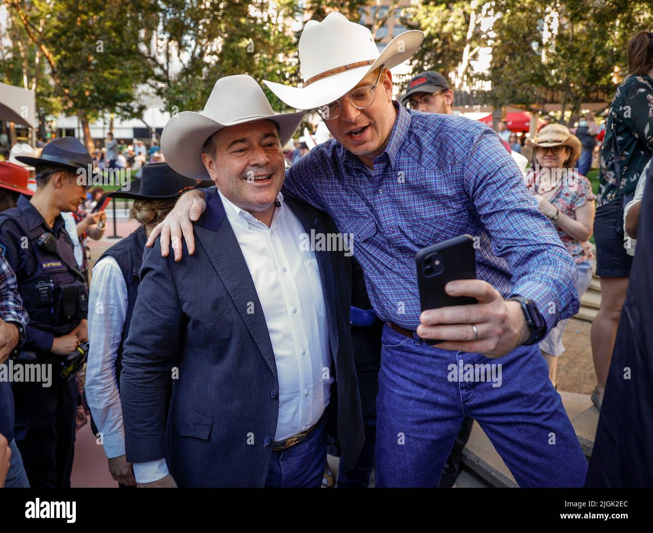 Alberta Premier Jason Kenney, left, poses for a photo with a supporter ...