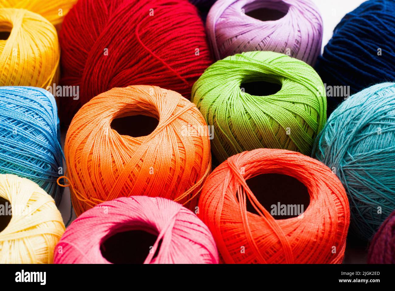 Colorful yarn of balls background Stock Photo - Alamy