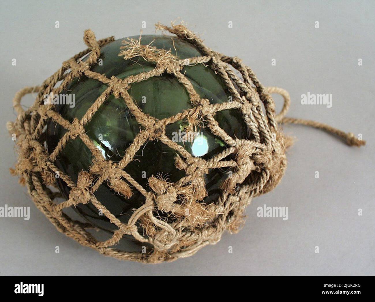 Flöte Floating, (fishing gear), green glass ball spun with hemp nets ...