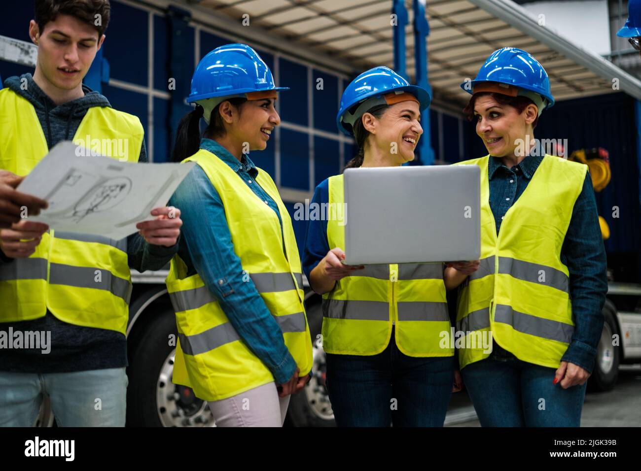 Group of robotic industry workers talking and using computers Stock ...