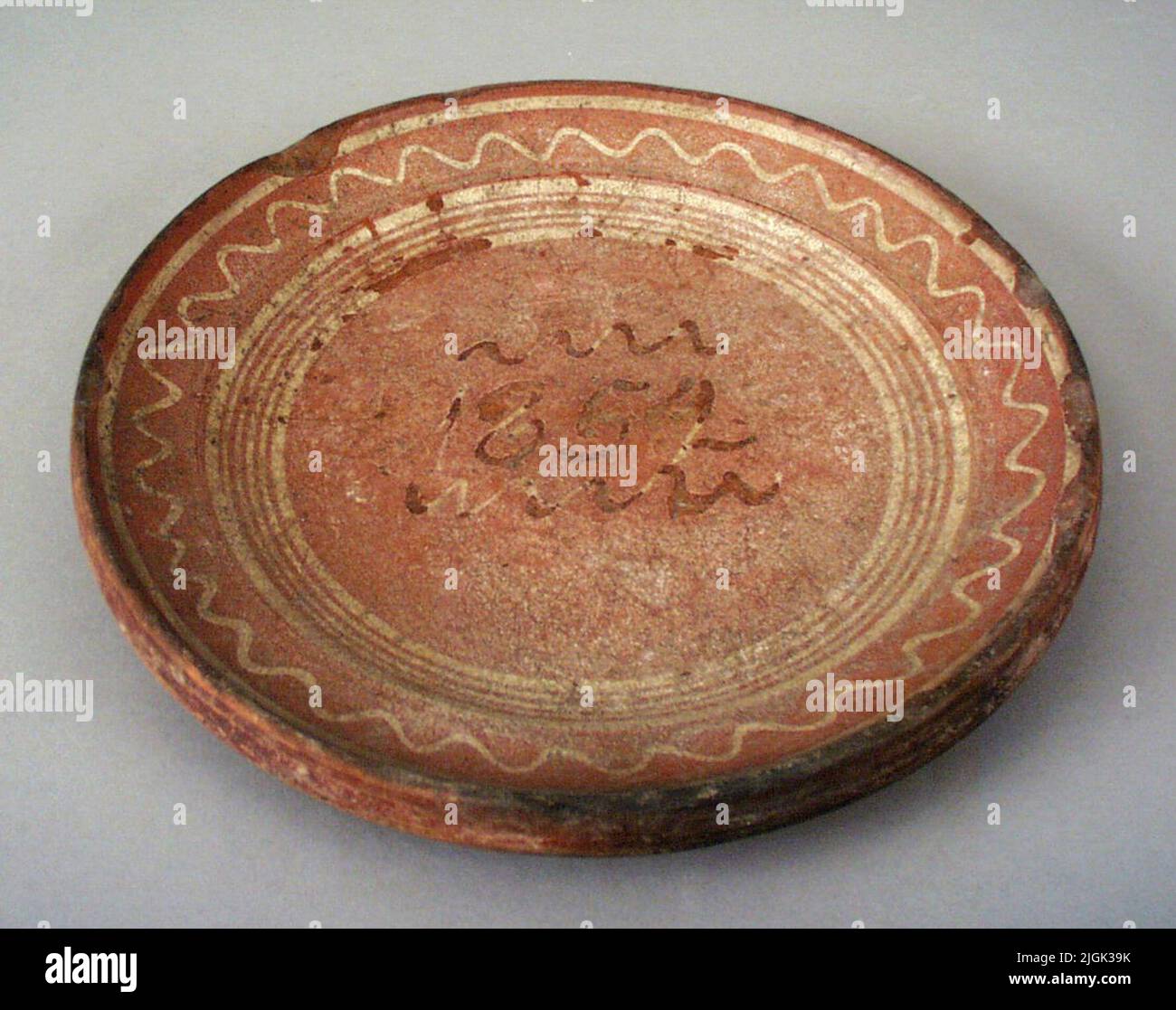 Fat Clay barrels. Stripes and wave lines as well as the year 1852 with ...