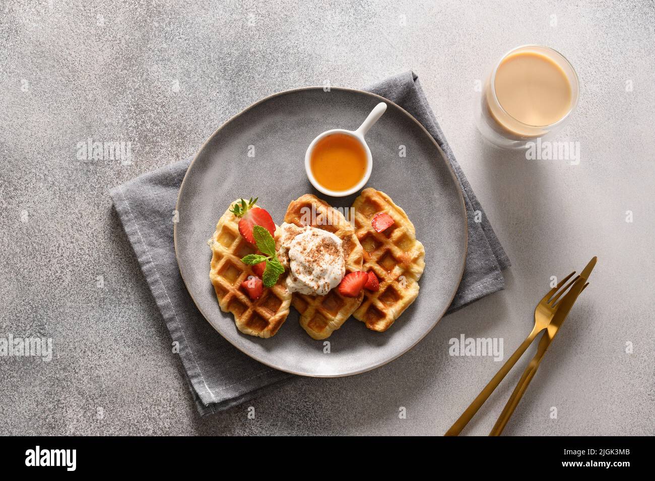 Trendy breakfast with croffles and morning coffee, strawberries on gray ...