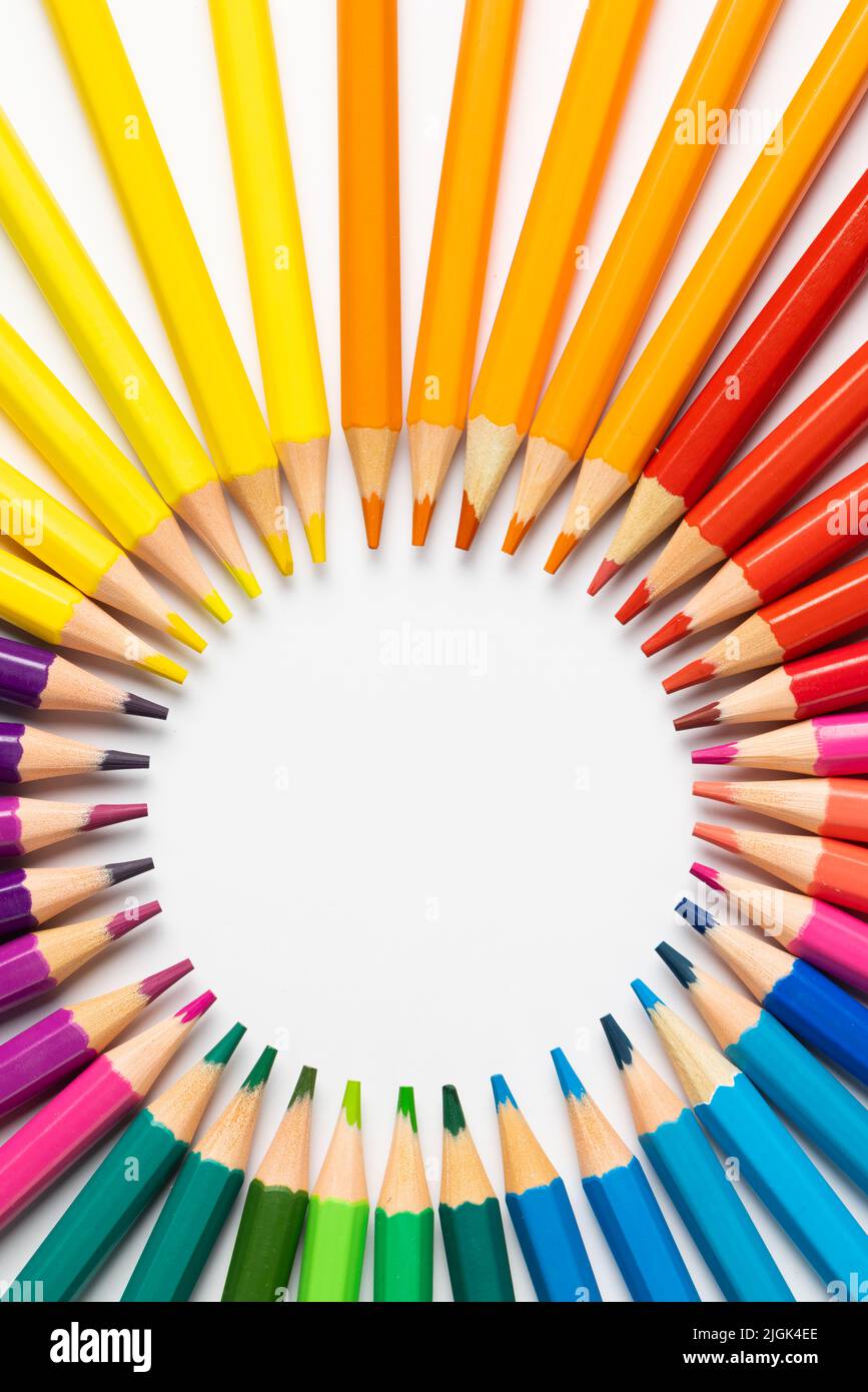 Vertical central composition of colorful crayons on white surface Stock ...