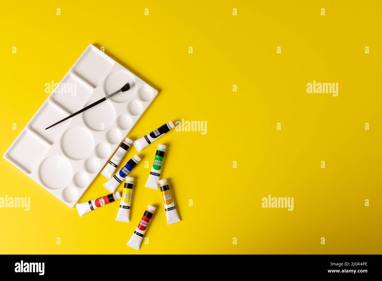 Image of painting tools on yellow surface with copy space Stock Photo ...