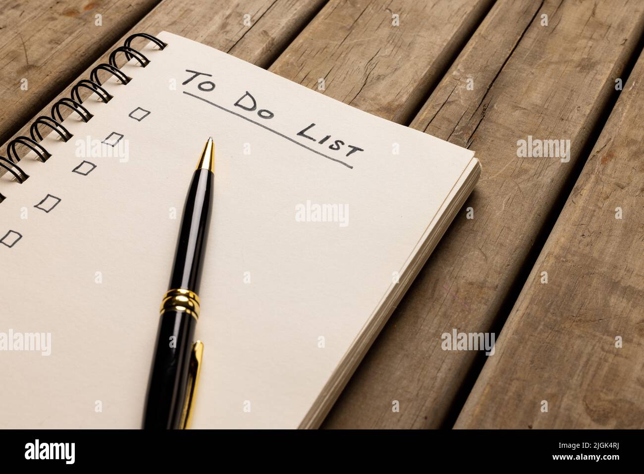 Image of notebook with to do list and copy space on wooden surface with ...