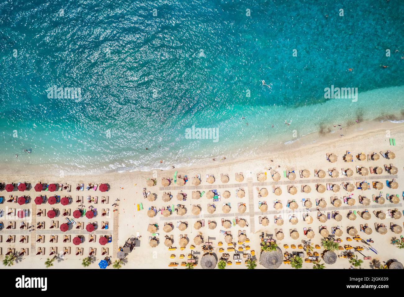 Aerial top down view to the emerald sea of the beach Akti Iliou, Athens ...