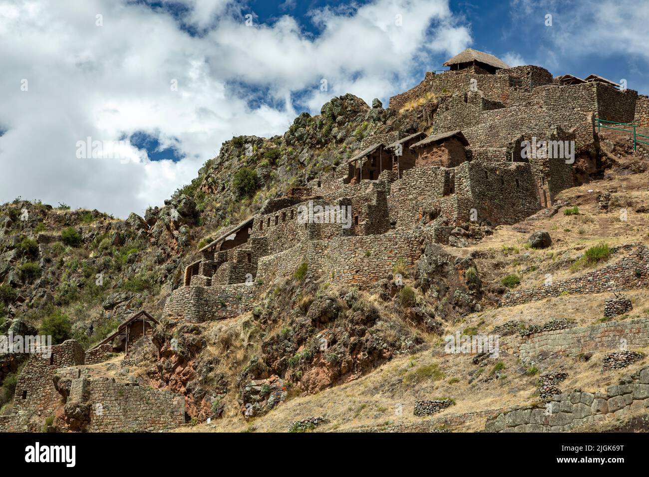 Buildings on cliff side, Pisac Inca ruins, Pisac, Cusco, Peru Stock ...
