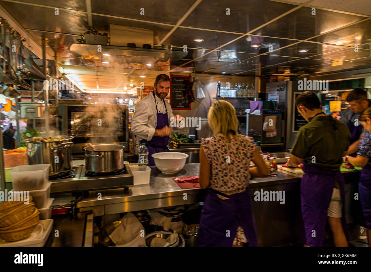 Cooking workshop in the market hall of Avignon, France Stock Photo - Alamy
