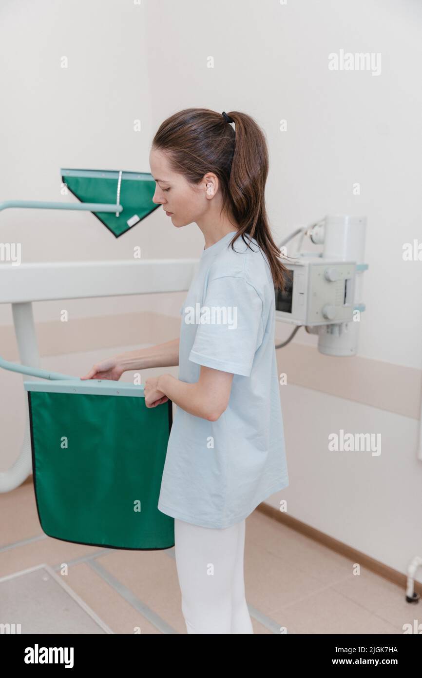 Hospital Radiology Room. Xray machine for fluorography. Woman patient ...